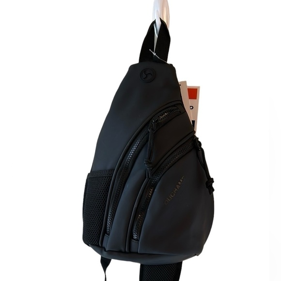 Duchamp | Bags | Duchamp Rubberized Sling Bag | Poshmark